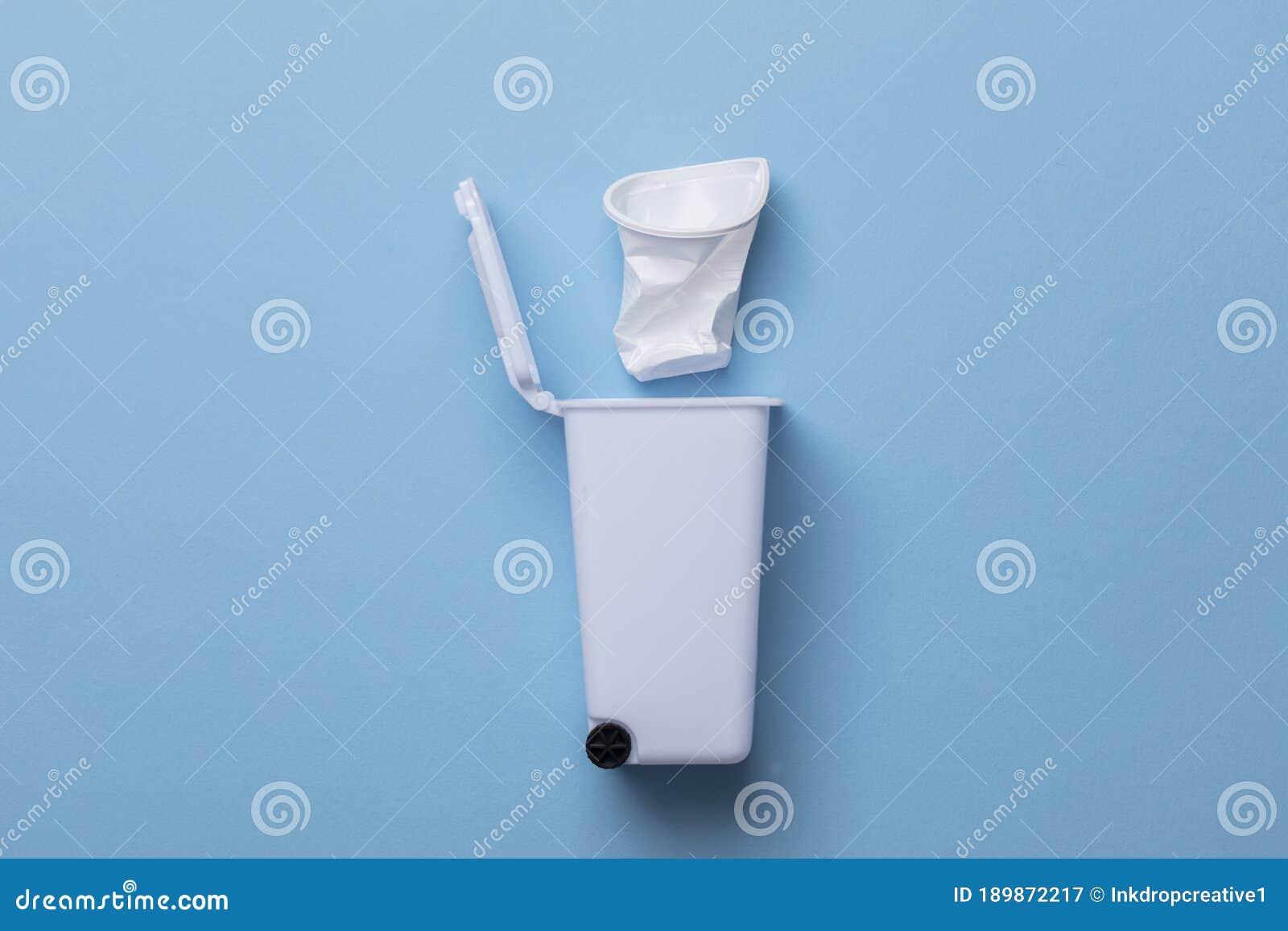 Lay Flat of Trash Bin with a Plastic Cup. Recycling Concept Stock Image ...