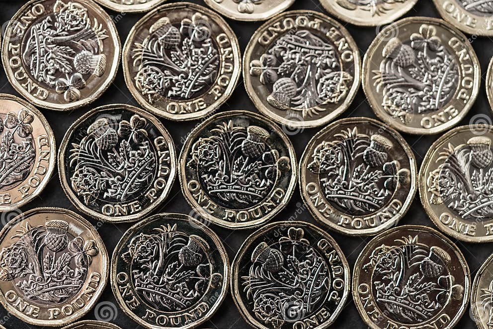 Layer of New Pound Coins Introduced in Britain in 2017 Stock Photo ...