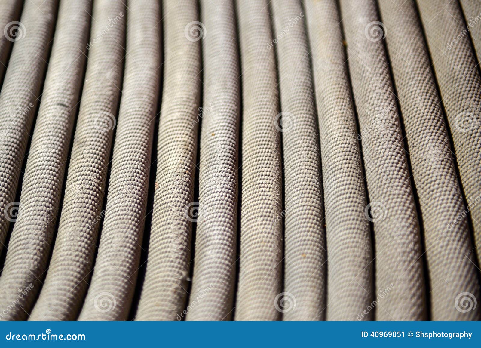 Layered Fire Hose stock image. Image of service, toned - 40969051