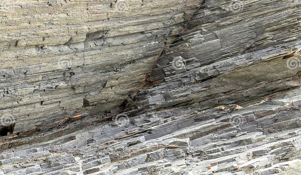 Layered Rock Formation with Distinct Horizontal Lines and Textures ...