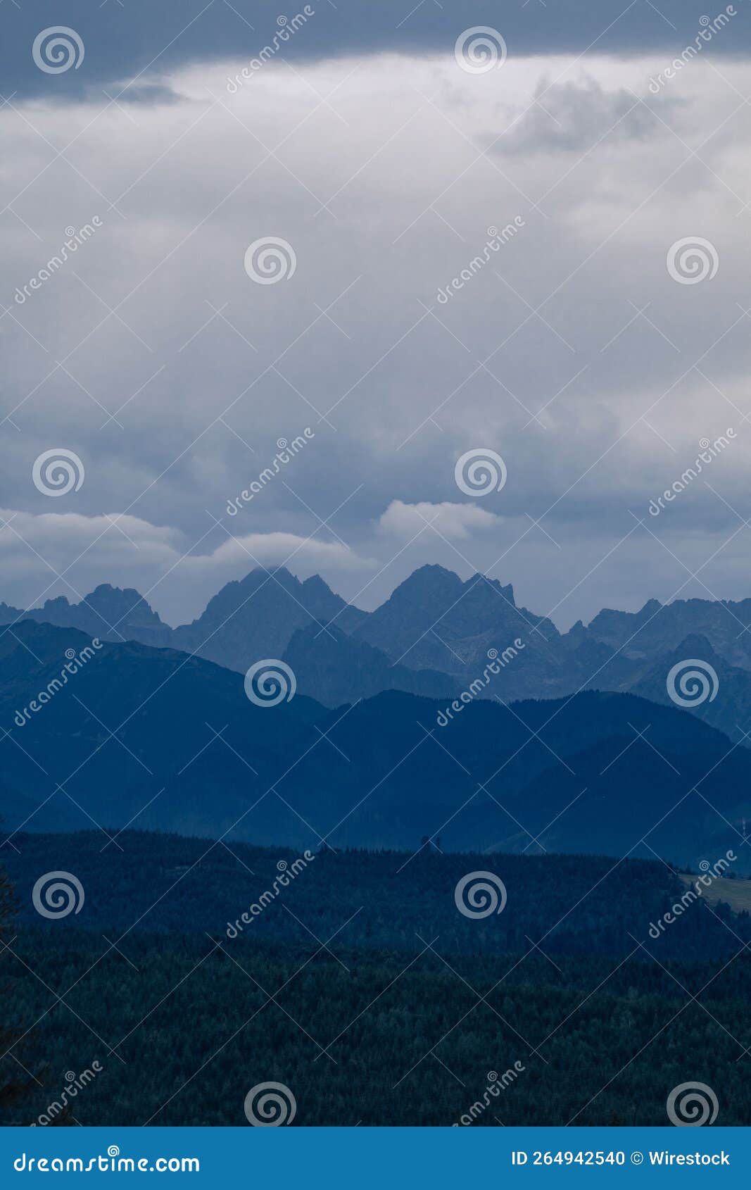 Layers of a Mountain Range in Shades of Blue, Vertical Stock Photo ...