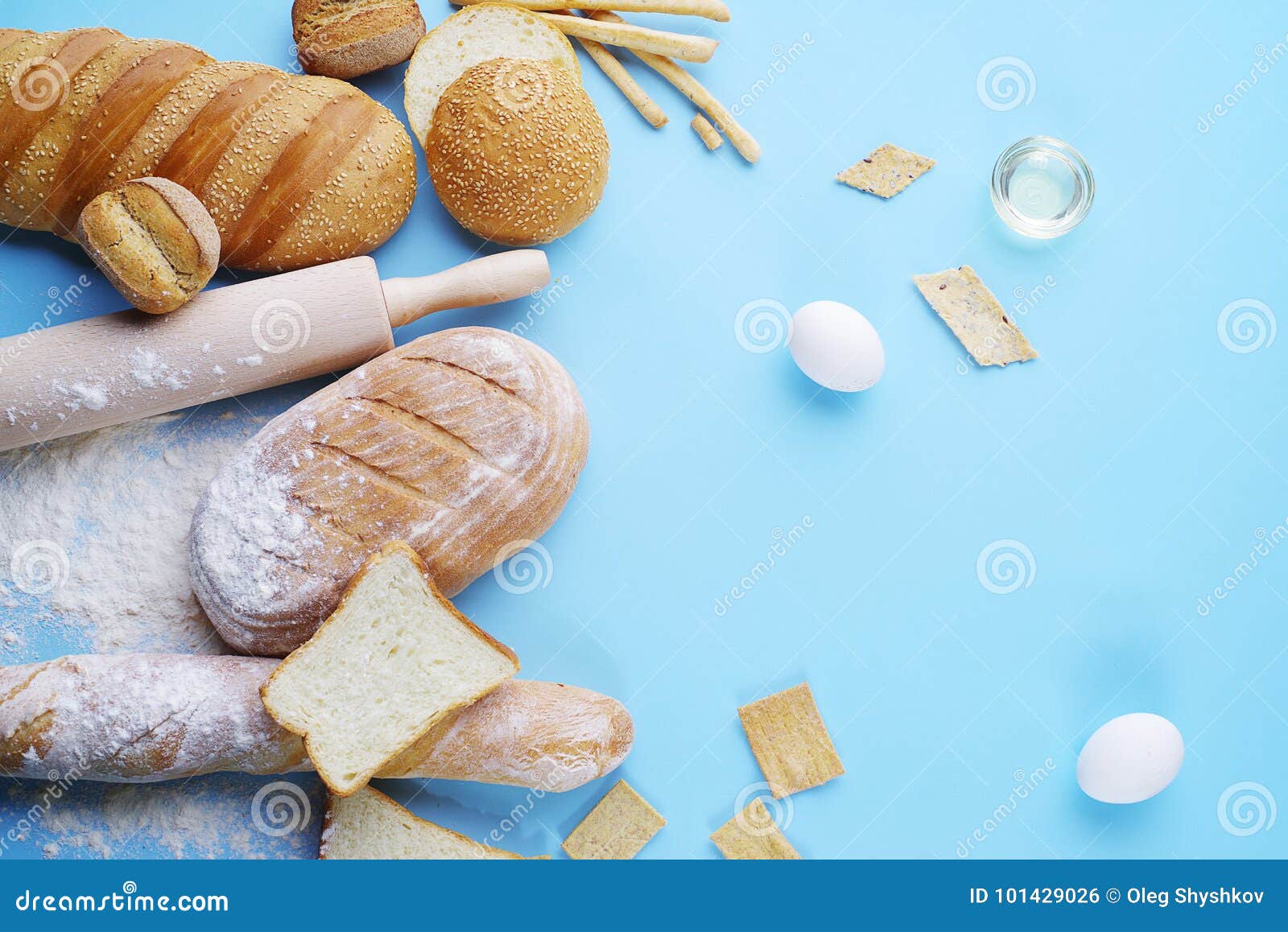 Laying Bread on a Blue Background Stock Photo - Image of wheat, bakery ...