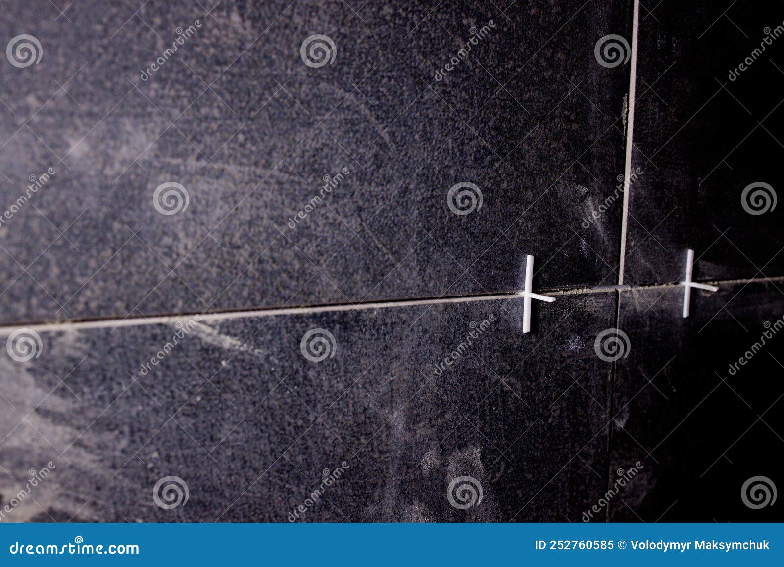 Laying Ceramic Tiles with the Help of Crosses for a Tile by during Wall ...