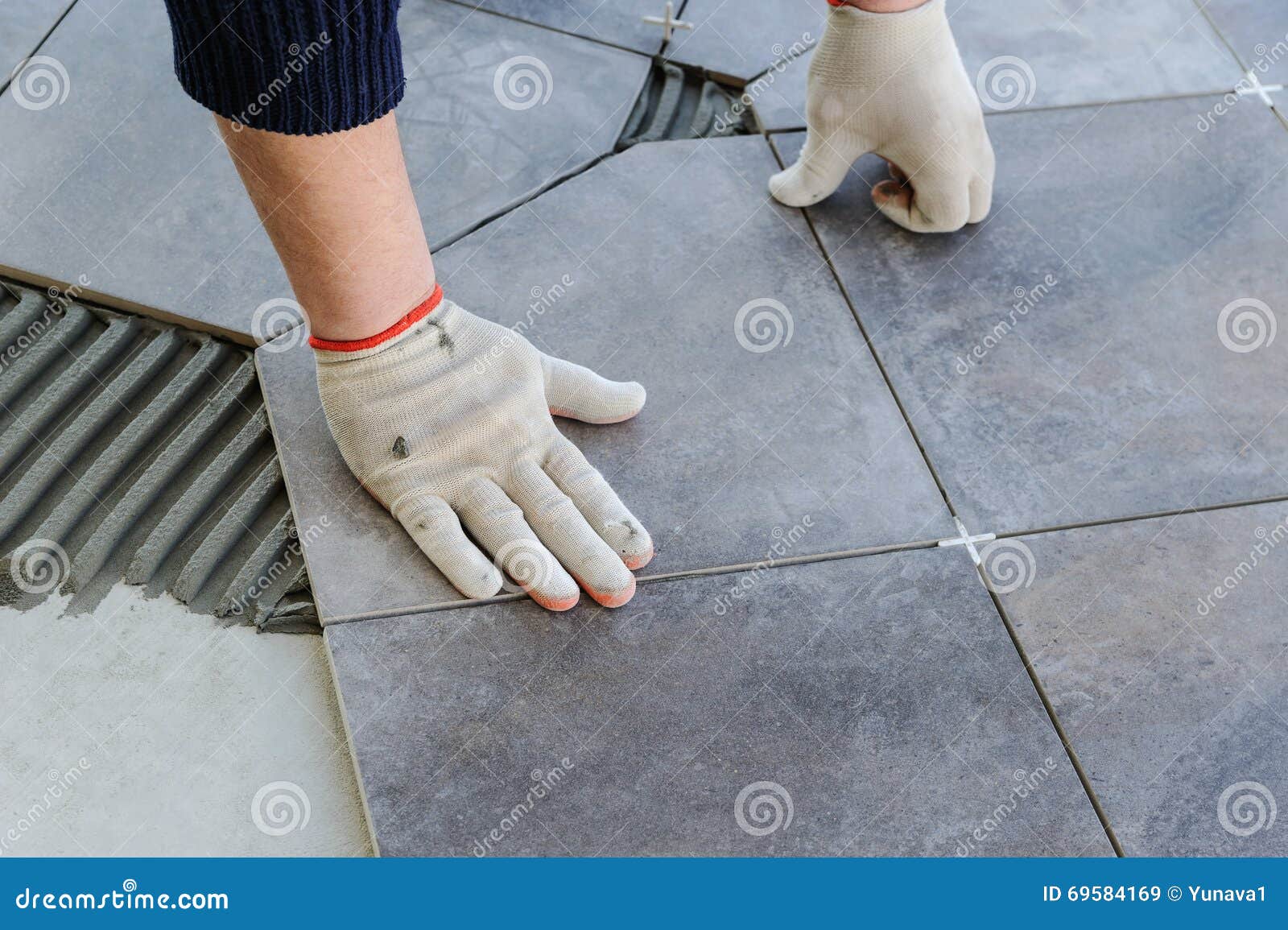 Laying Ceramic Tiles. stock image. Image of closeup, craftsman - 69584169