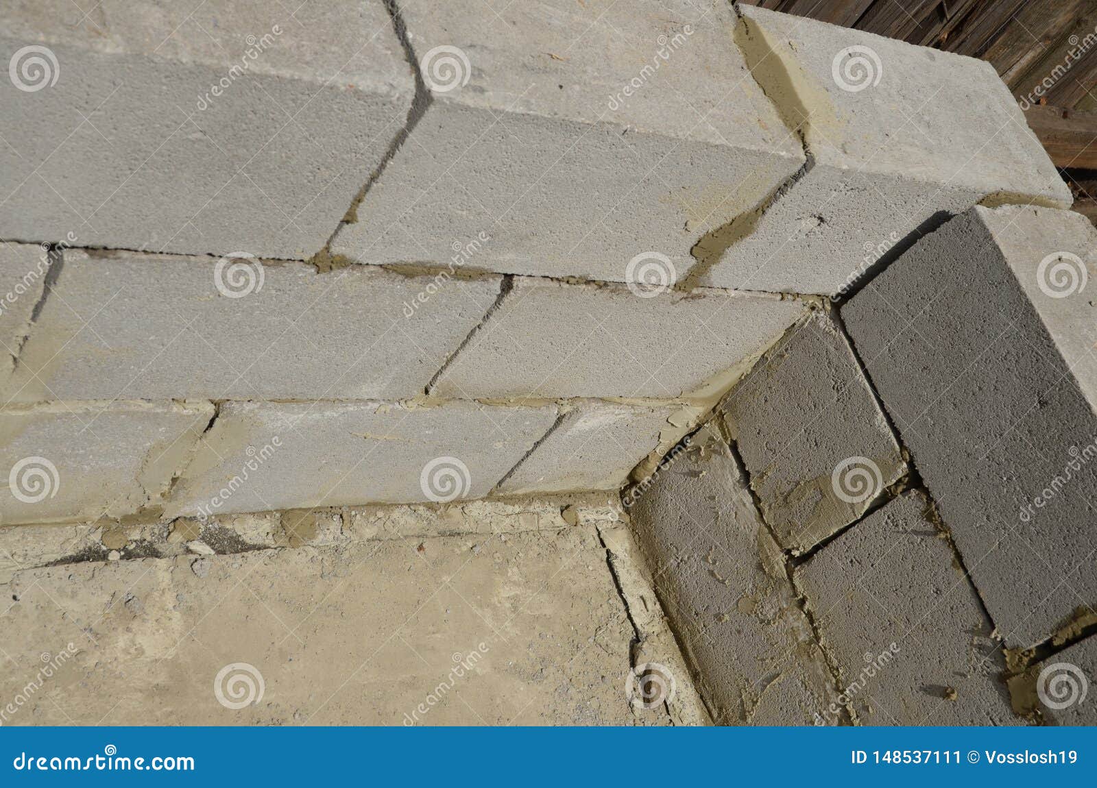 Laying the Corner of the Building of Cinder Block Thickness of the ...