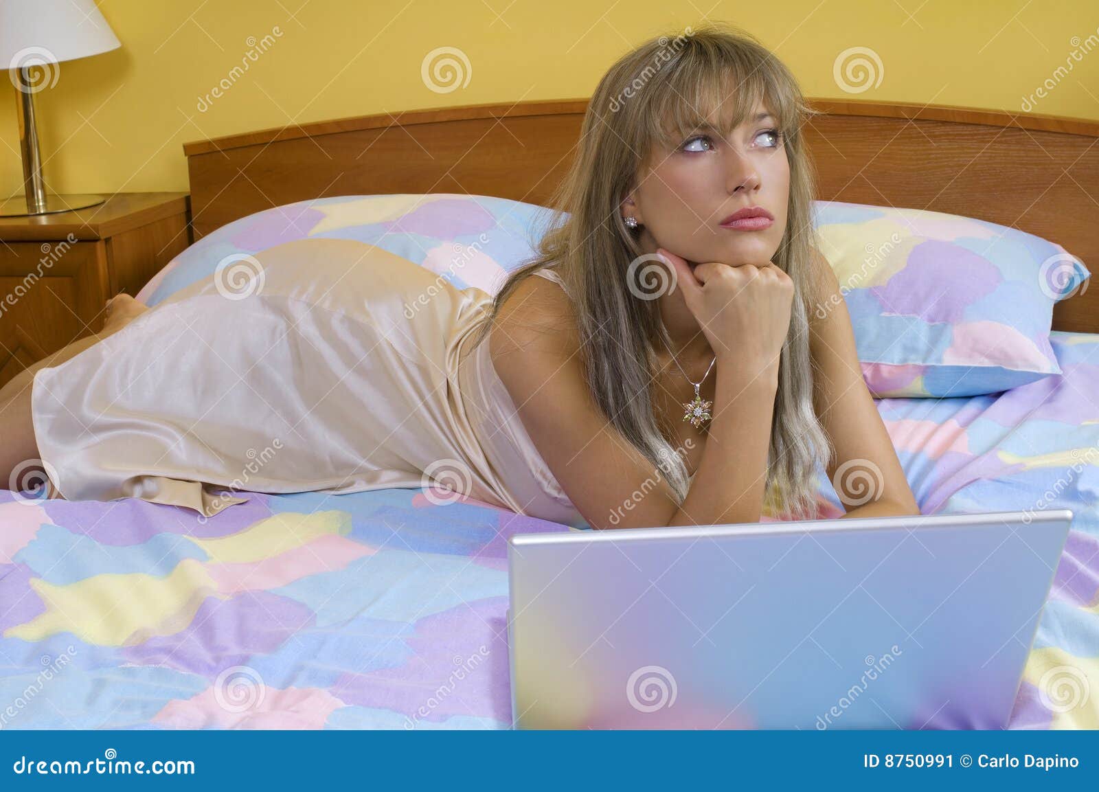 Laying down with laptop stock image. Image of beauty, bedroom - 8750991