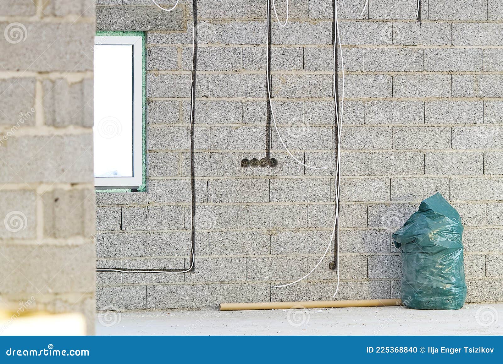 Laying of Electrics and Other Engineering Systems in a Stone Wall in a ...