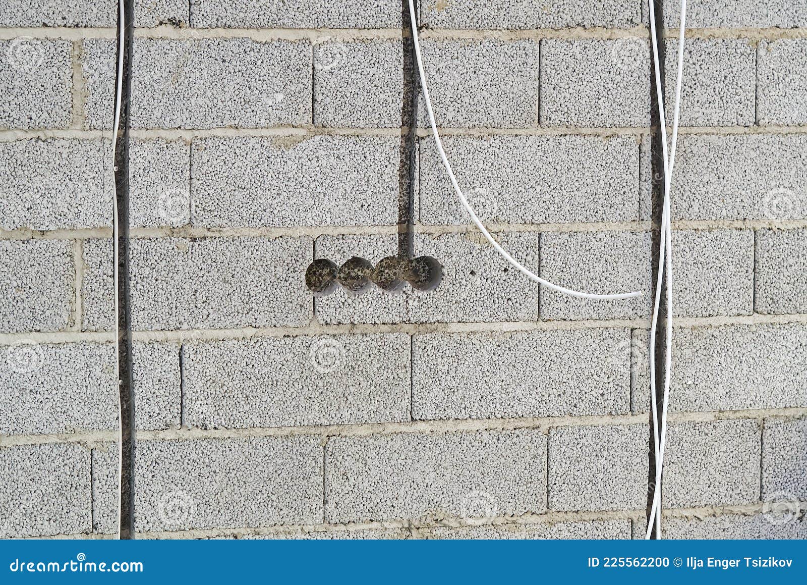 Laying of Electrics and Other Engineering Systems in a Stone Wall in a ...