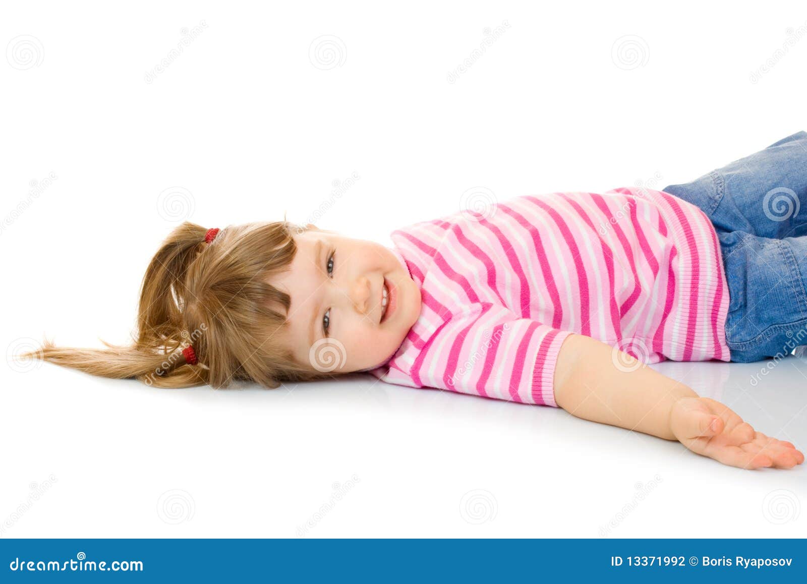 Laying funny little girl stock photo. Image of people - 13371992