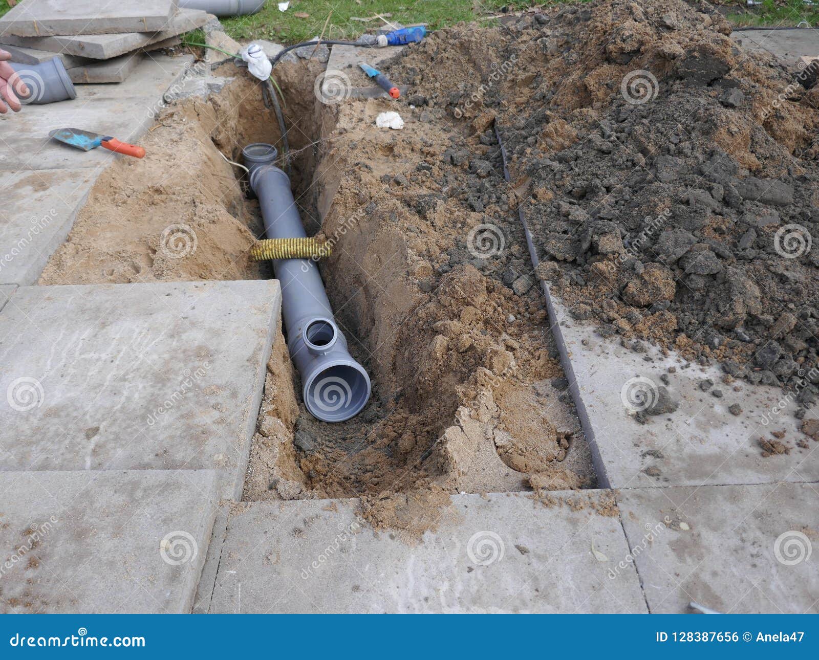 Laying and Installation of a Sewer Pipe Stock Photo - Image of ...
