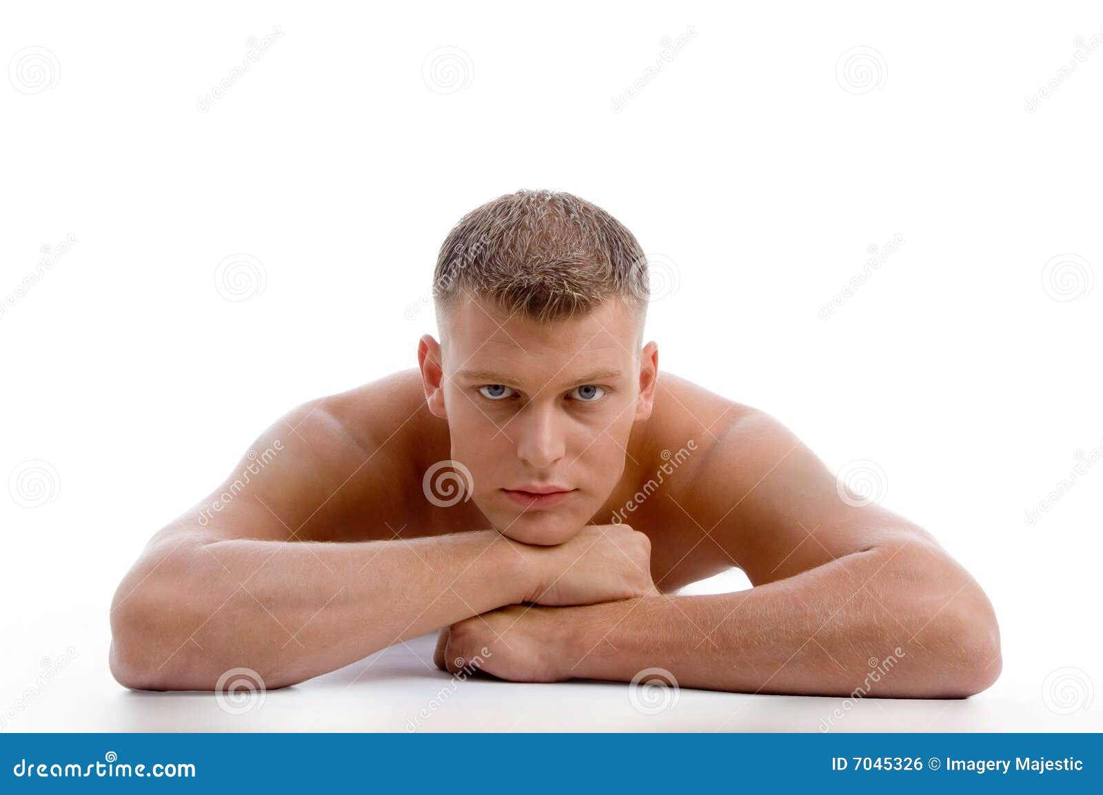 Bodybuilder Man Laying In Grass Royalty-Free Stock Photography ...
