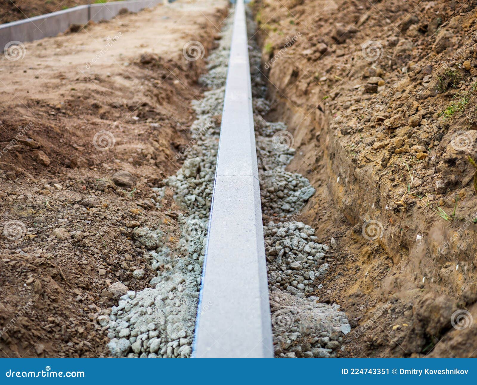 Laying of a New Concrete Curb. Creating a Pedestrian Path Stock Image ...