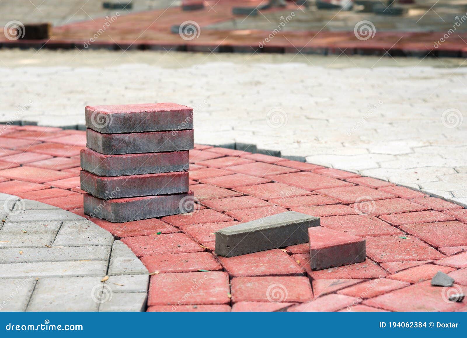 Laying New Pavement Tiles on the Street Stock Photo - Image of ...