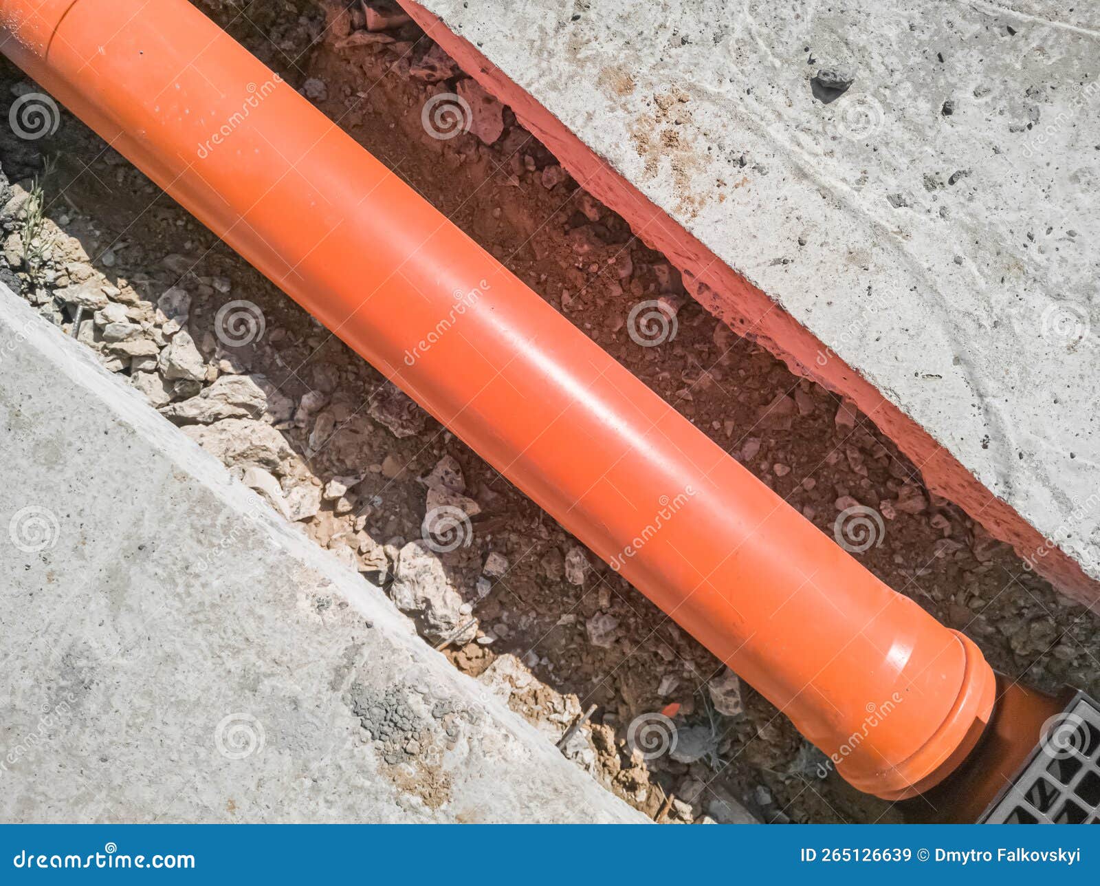Laying an Orange Plastic Drainage Pipe. Stock Image - Image of ...