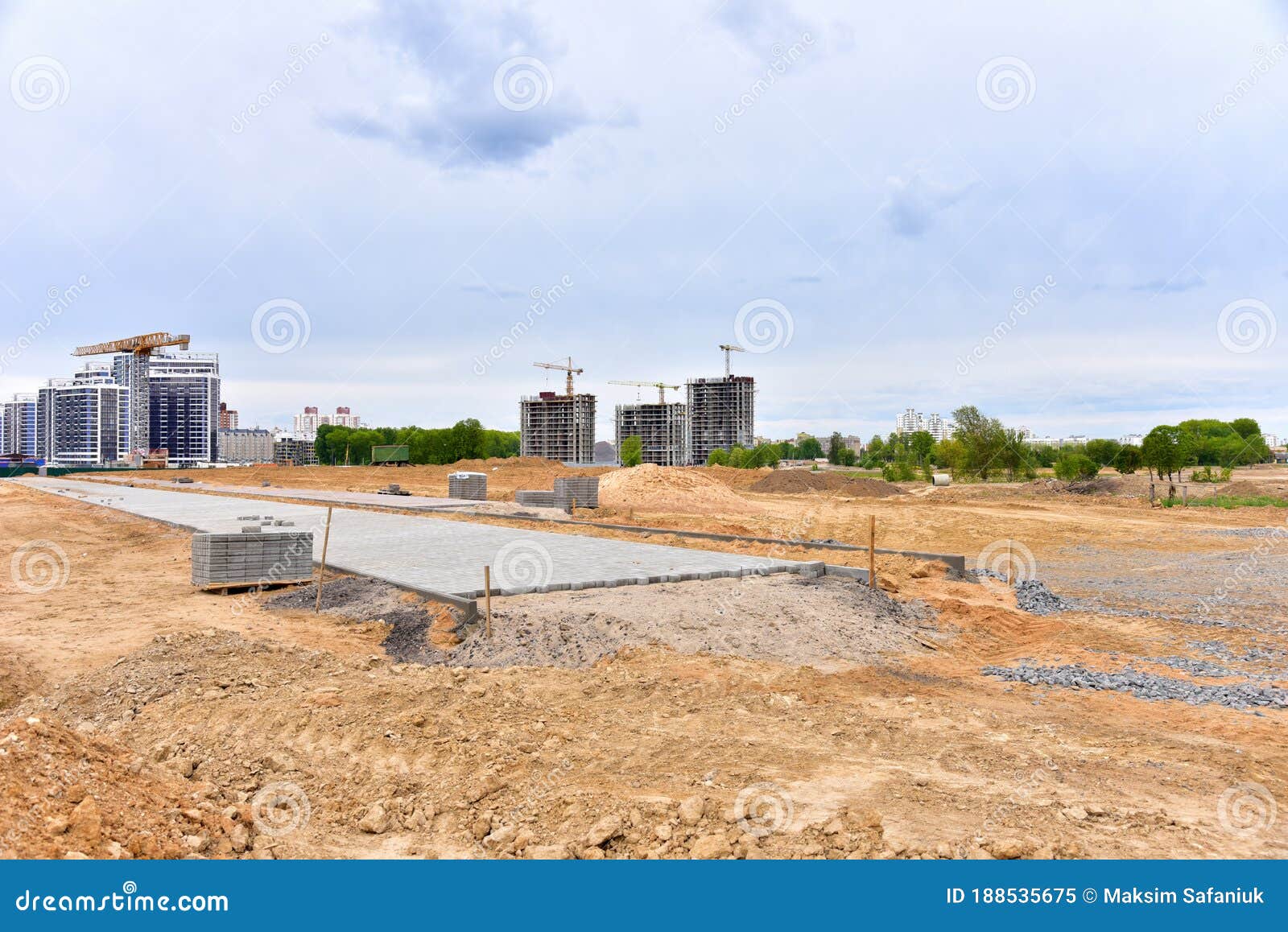 Laying Paving Slabs and Borders at Construction Site. Process of ...