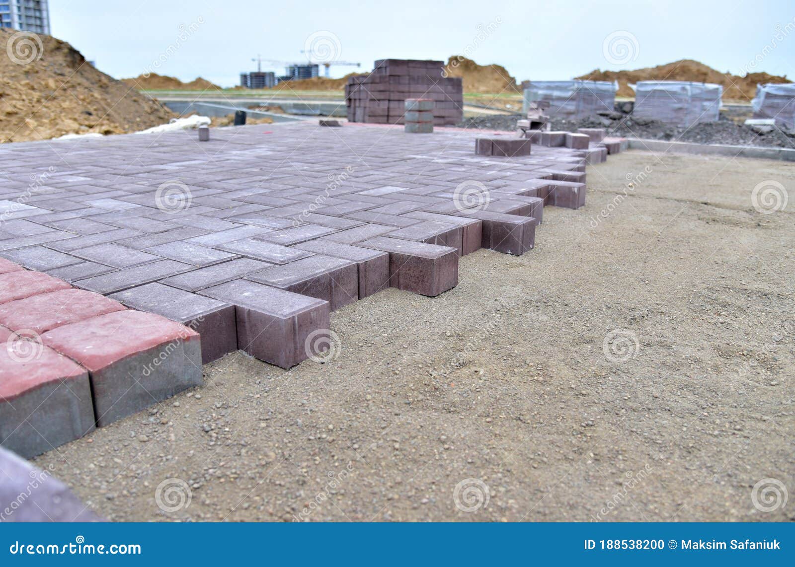Laying Paving Slabs and Borders at Construction Site. Process of ...