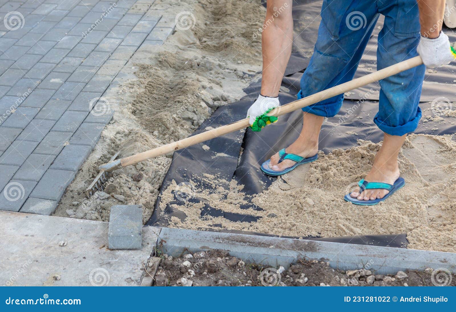 Laying Paving Slabs at a Construction Site. Stock Photo - Image of ...