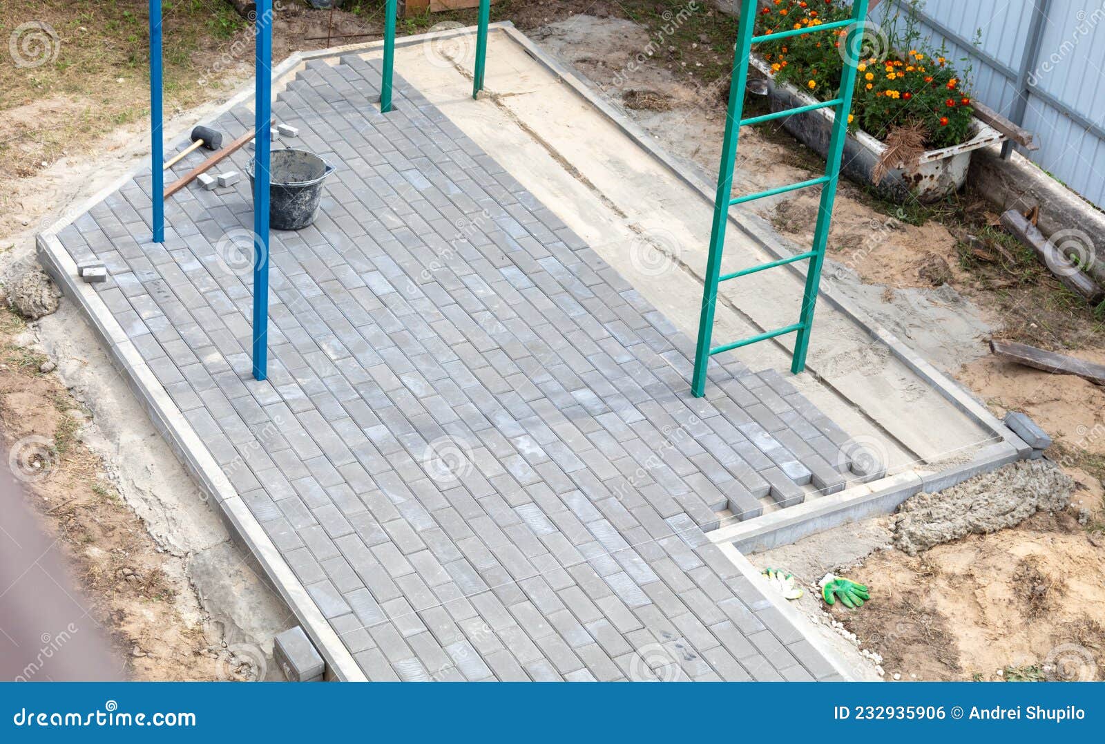 Laying Paving Slabs at a Construction Site. Stock Photo - Image of ...