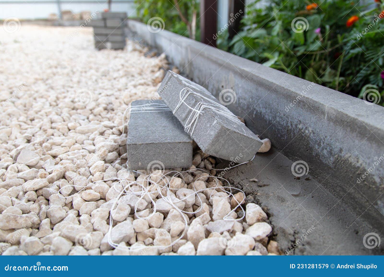 Laying Paving Slabs at a Construction Site. Stock Image - Image of ...