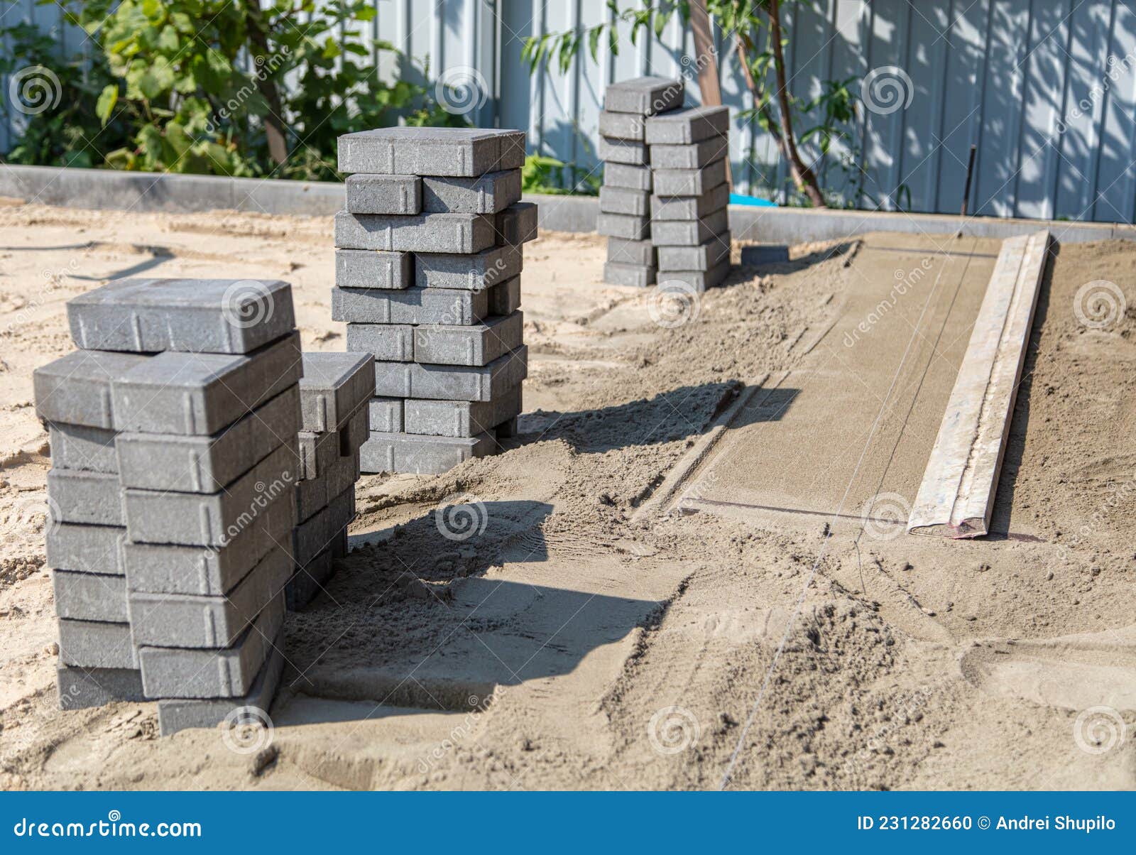 Laying Paving Slabs at a Construction Site. Stock Photo - Image of city ...
