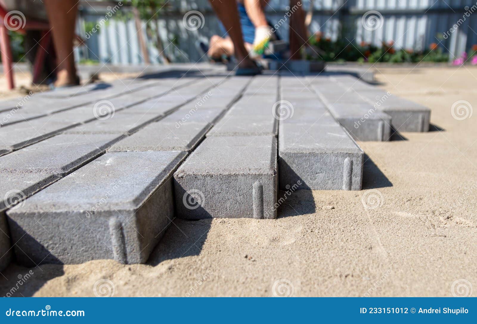 Laying Paving Slabs at a Construction Site. Stock Photo - Image of ...