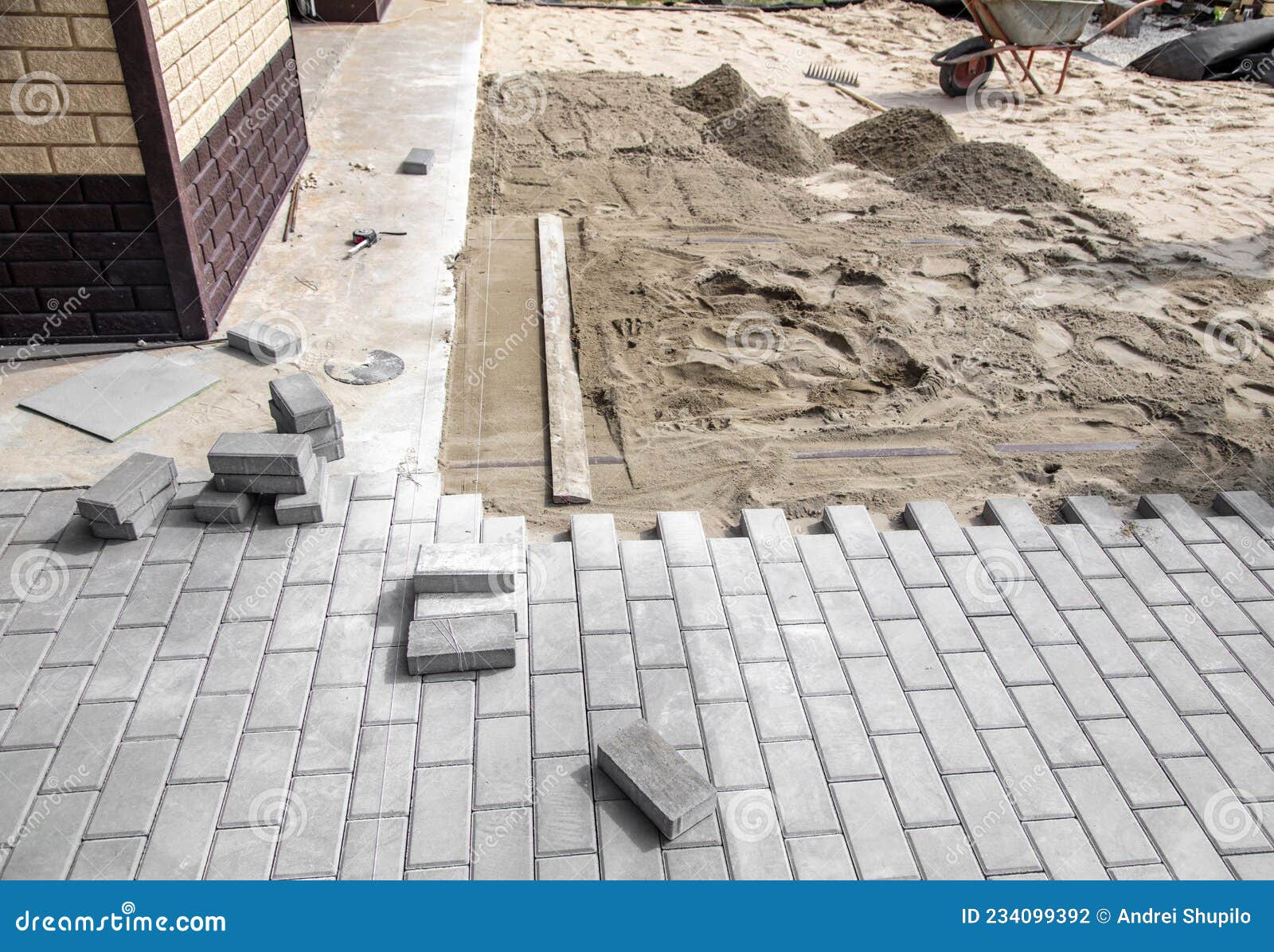 Laying Paving Slabs at a Construction Site. Stock Photo - Image of ...