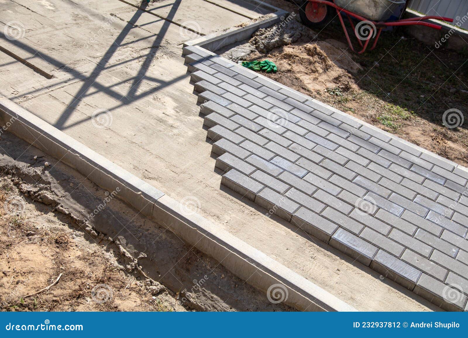 Laying Paving Slabs at a Construction Site. Stock Photo - Image of ...