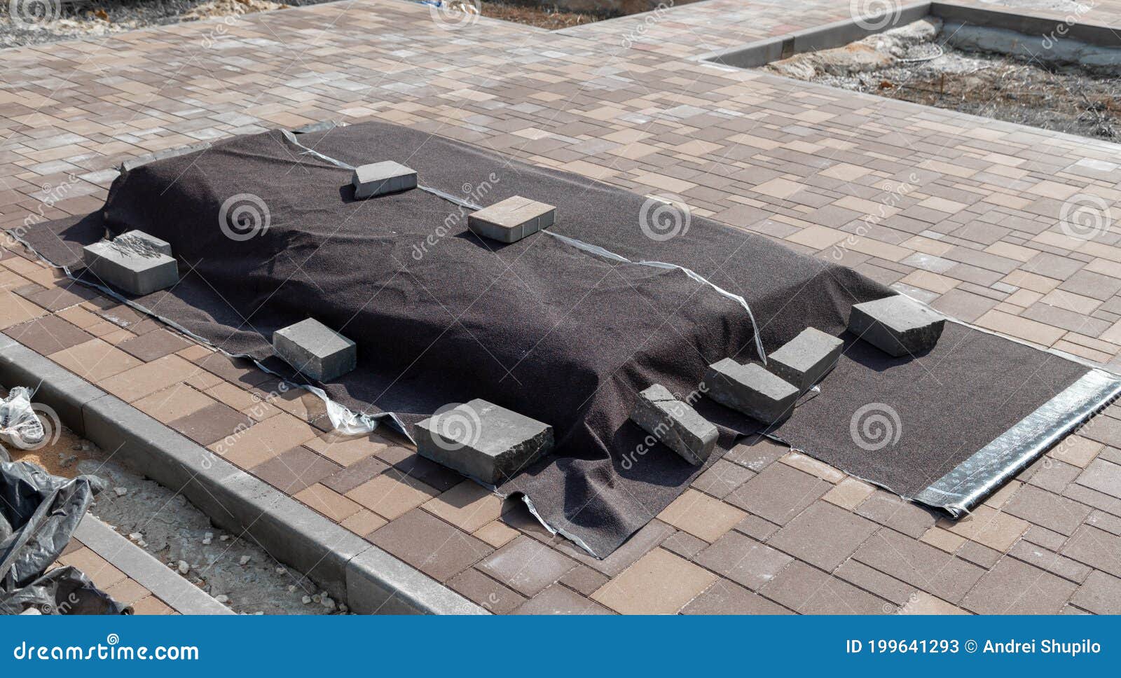 Laying Paving Slabs on the Ground Stock Image - Image of street, grey ...