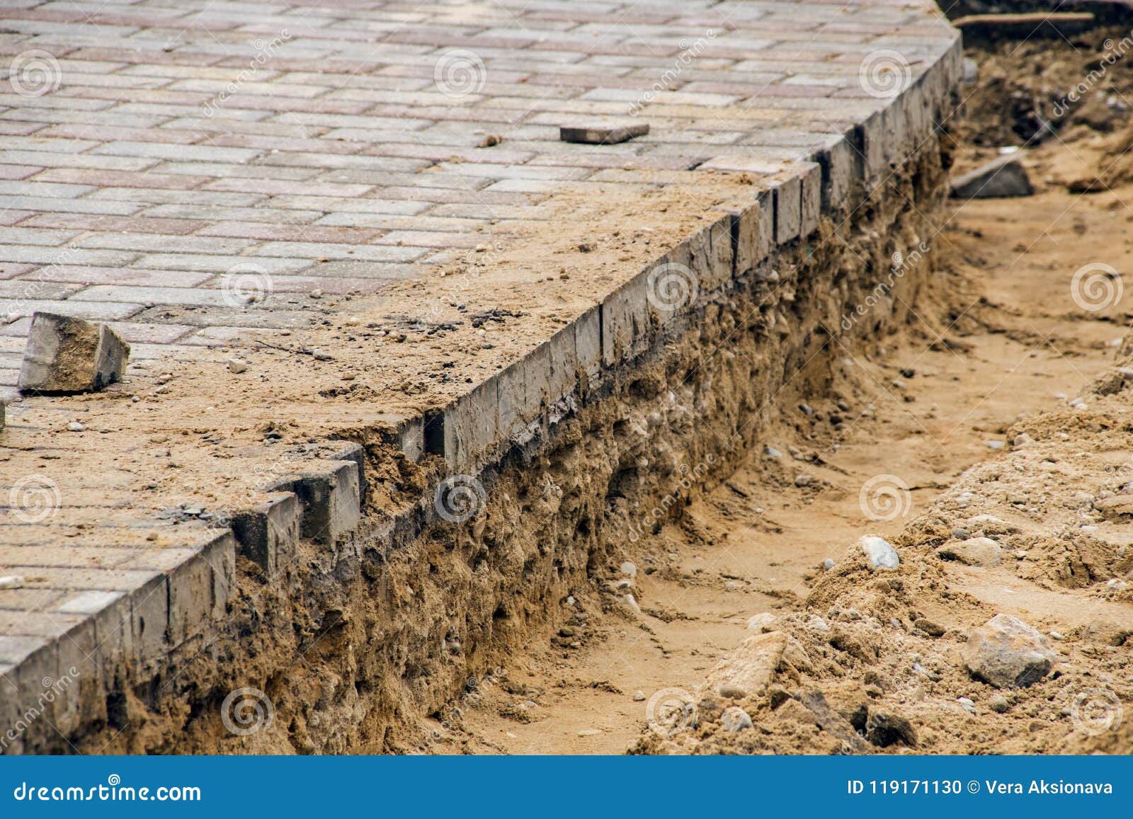Laying Paving Slabs on Sand Stock Photo - Image of rusty, material ... Laying Paving Slabs on Sand Stock Photo - Image of rusty, material ...