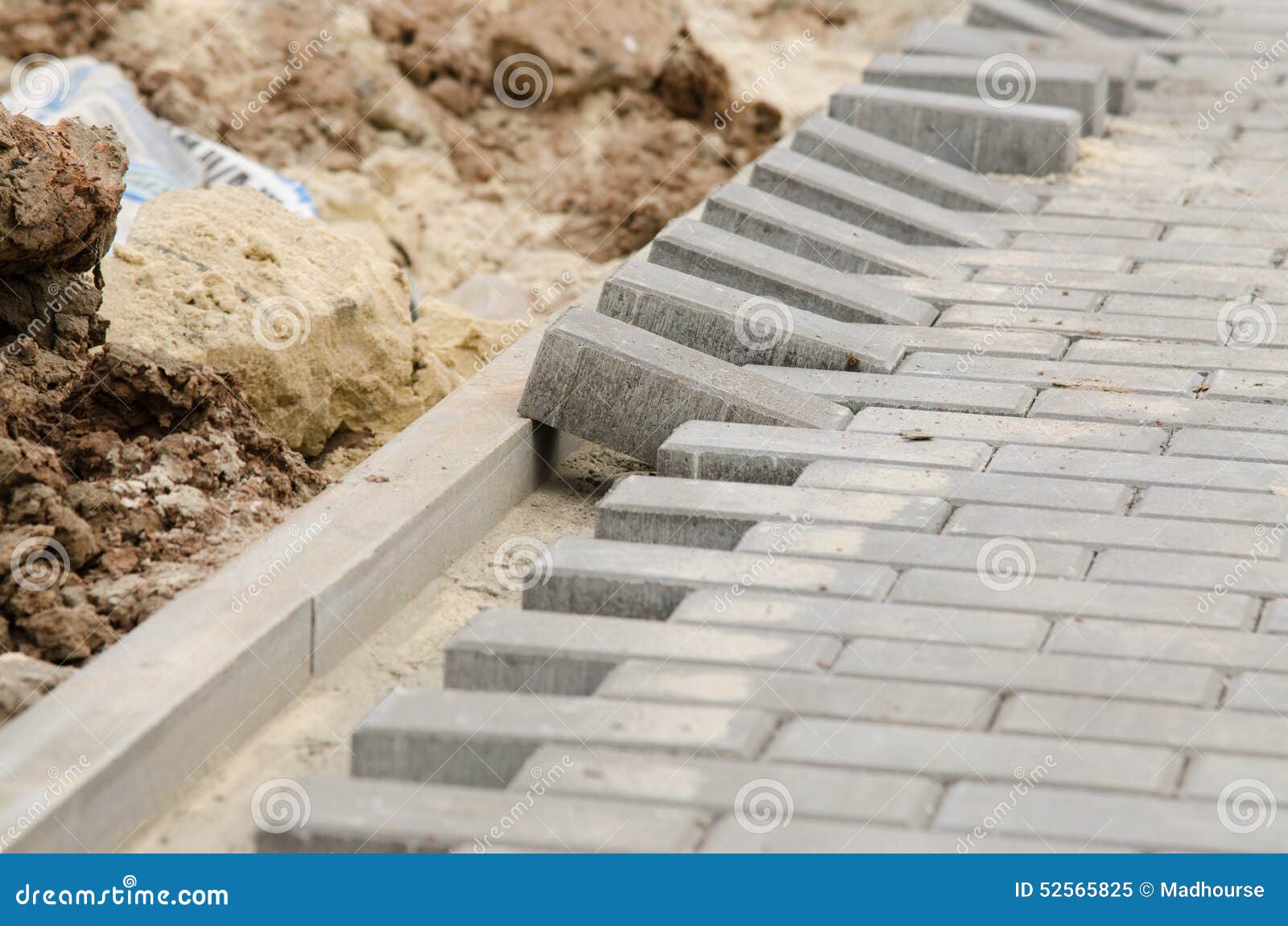 Laying of Paving Slabs To Curb Stock Image - Image of laying, stones ...