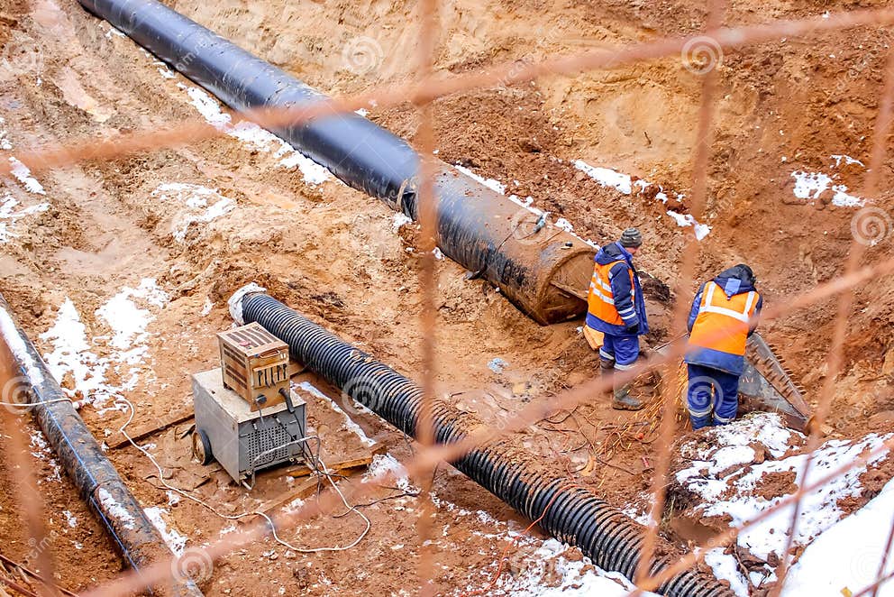 Laying the Pipe Under the Road Editorial Image - Image of welding ...