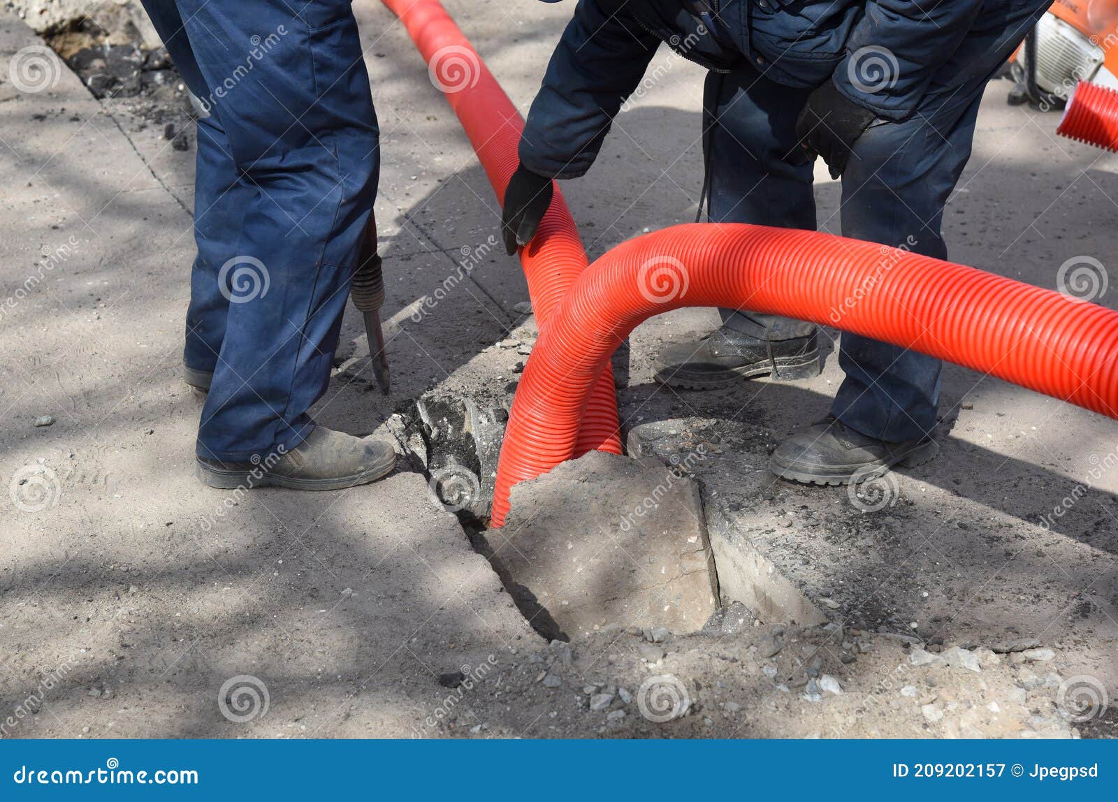 Laying Pipes in the Road Surface. Stock Image - Image of pipe ...