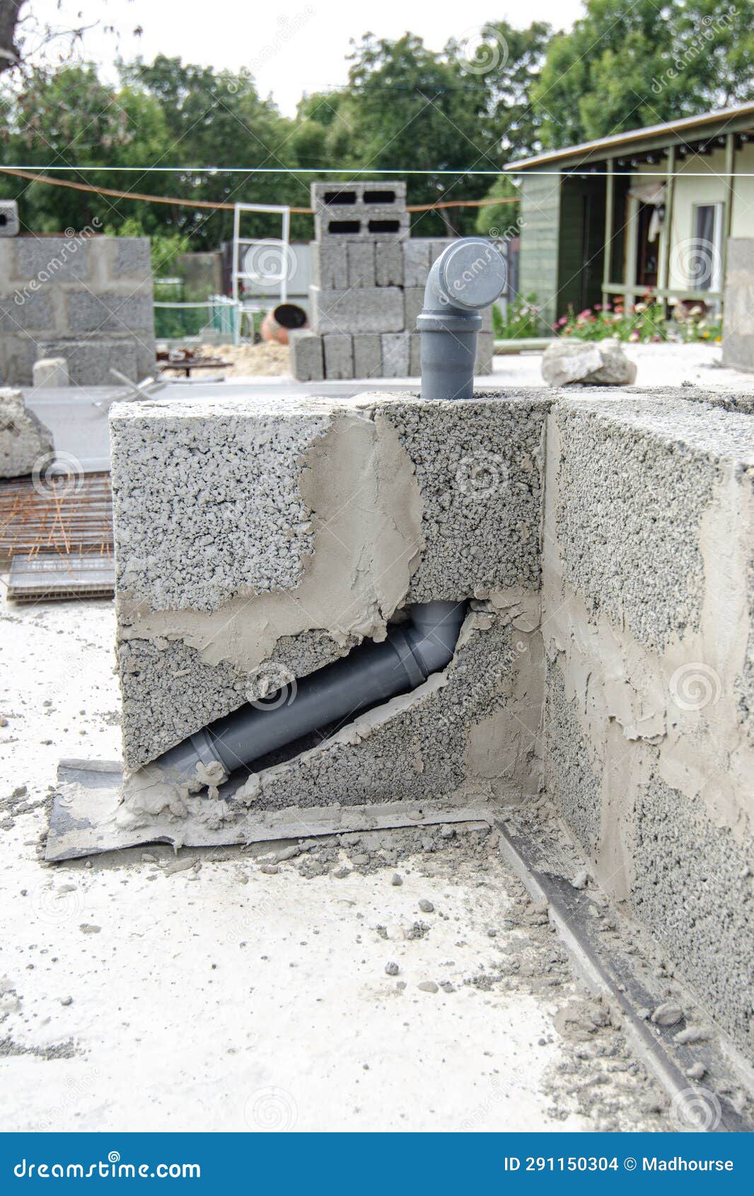 Laying a Sewer Pipe in the Wall during the Construction of a House ...