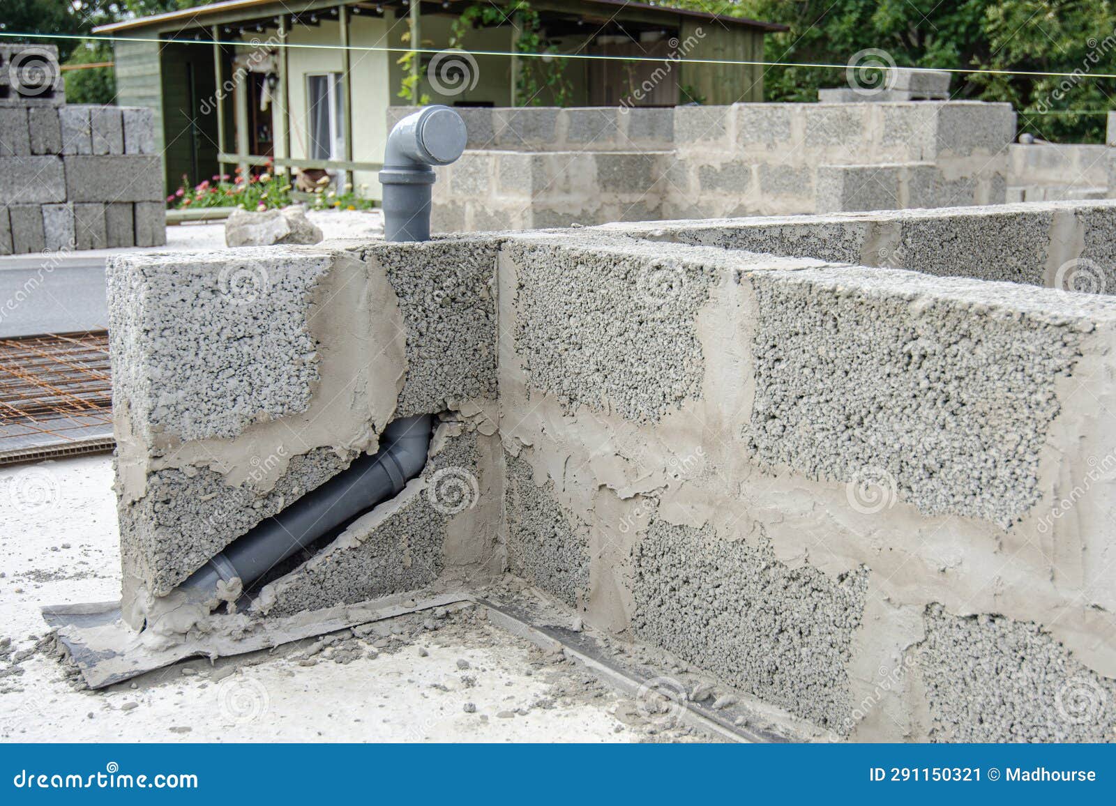 Laying a Sewer Pipe in the Wall during the Construction of a House ...