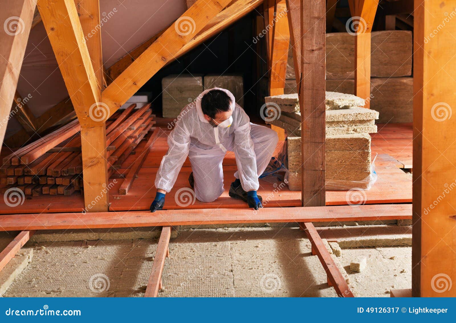 Laying Thermal Insulation - Installing the Planking Stock Image - Image ...