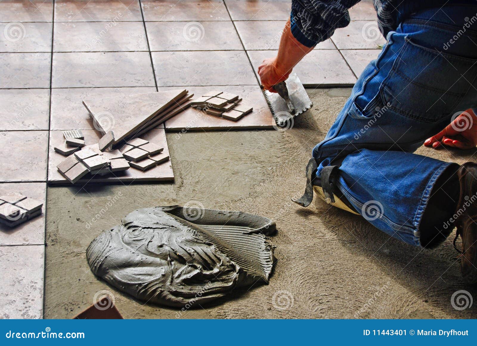Man laying floor tile stock image. Image of trade, improvement - 11443401