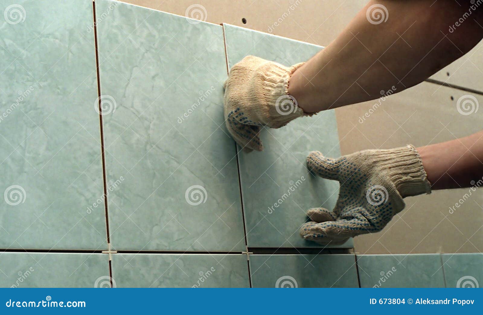 Laying tile stock photo. Image of tile, stone, installer - 673804