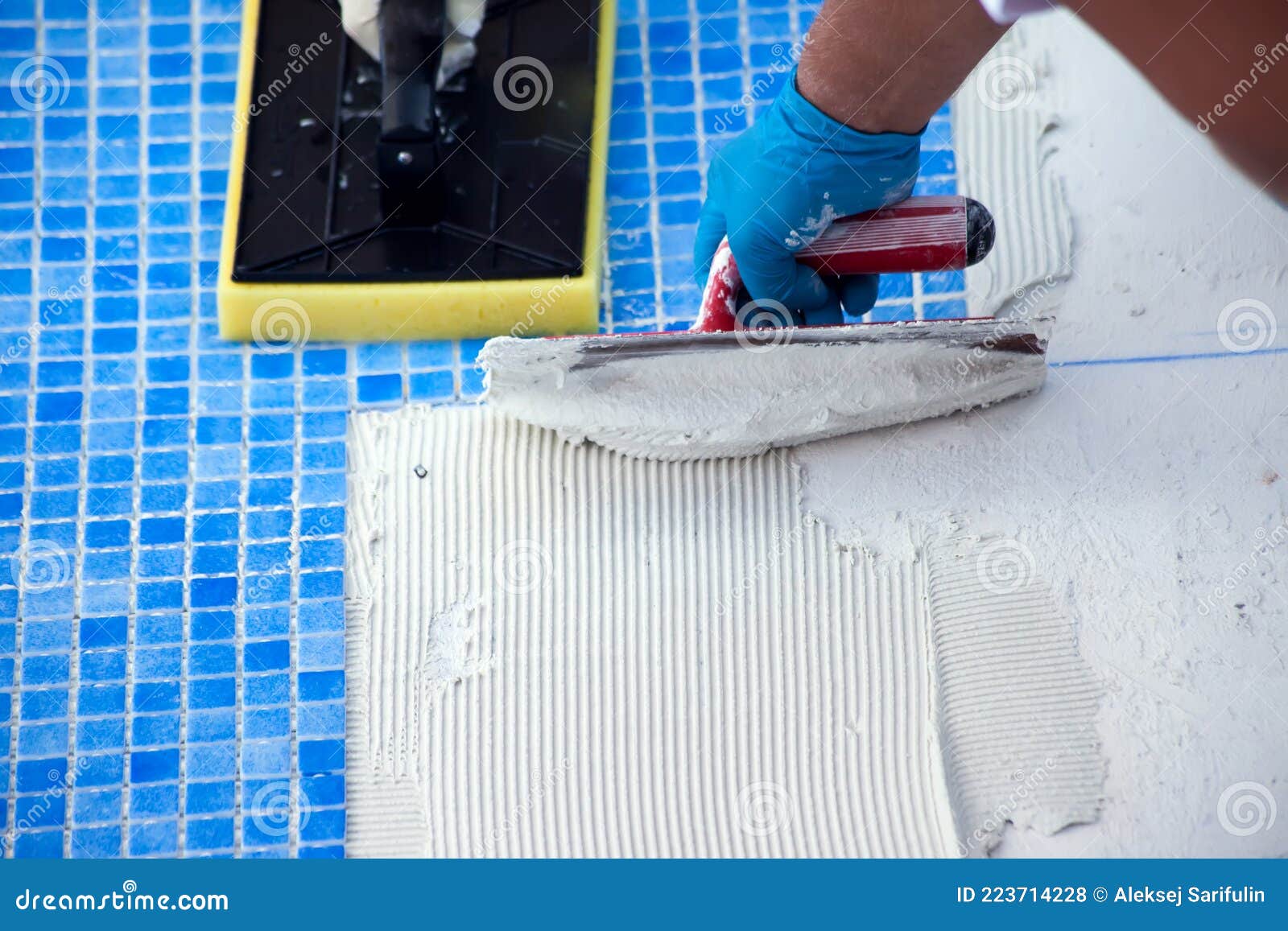 Laying Tile in the Pool. Pool Repairing Work Stock Photo - Image of ...