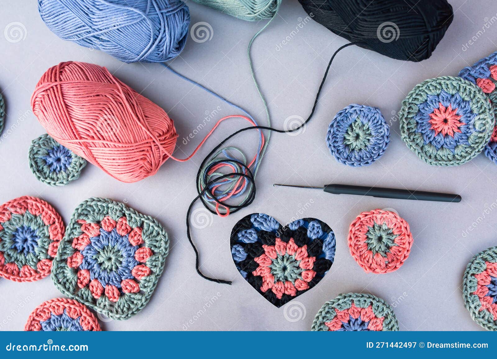 Layout of Crochet Patterns, a Hook, a Heart and Yarns Around on Grey ...