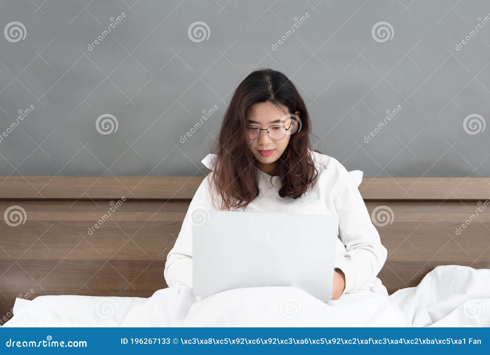 Lazy Chinese Girl Using Computer Bed Office Stock Image - Image of ...