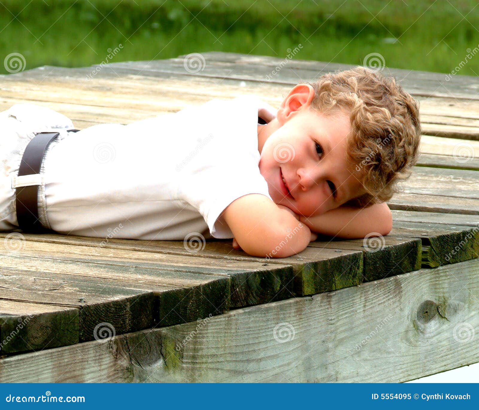 Lazy Day Boy stock image. Image of outdoor, daydreaming - 5554095