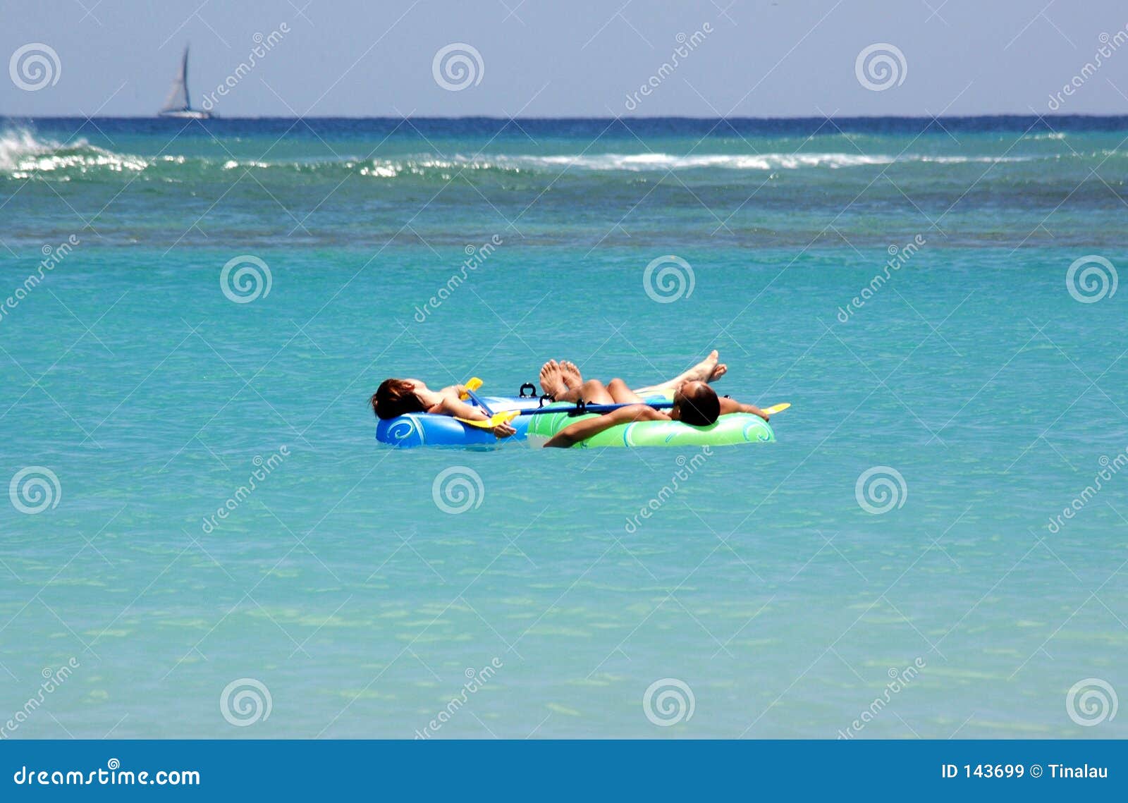 Lazy day in the water editorial stock image. Image of couple - 143699