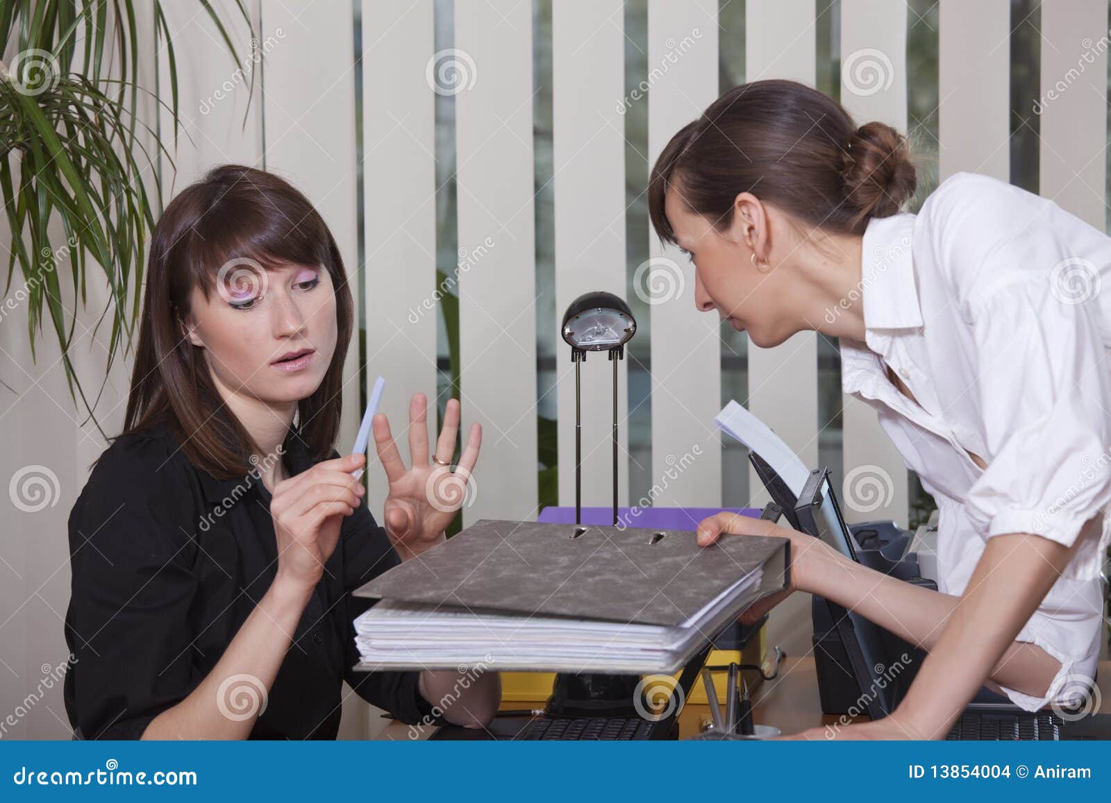 Lazy female secretary stock photo. Image of folders, manicure - 13854004