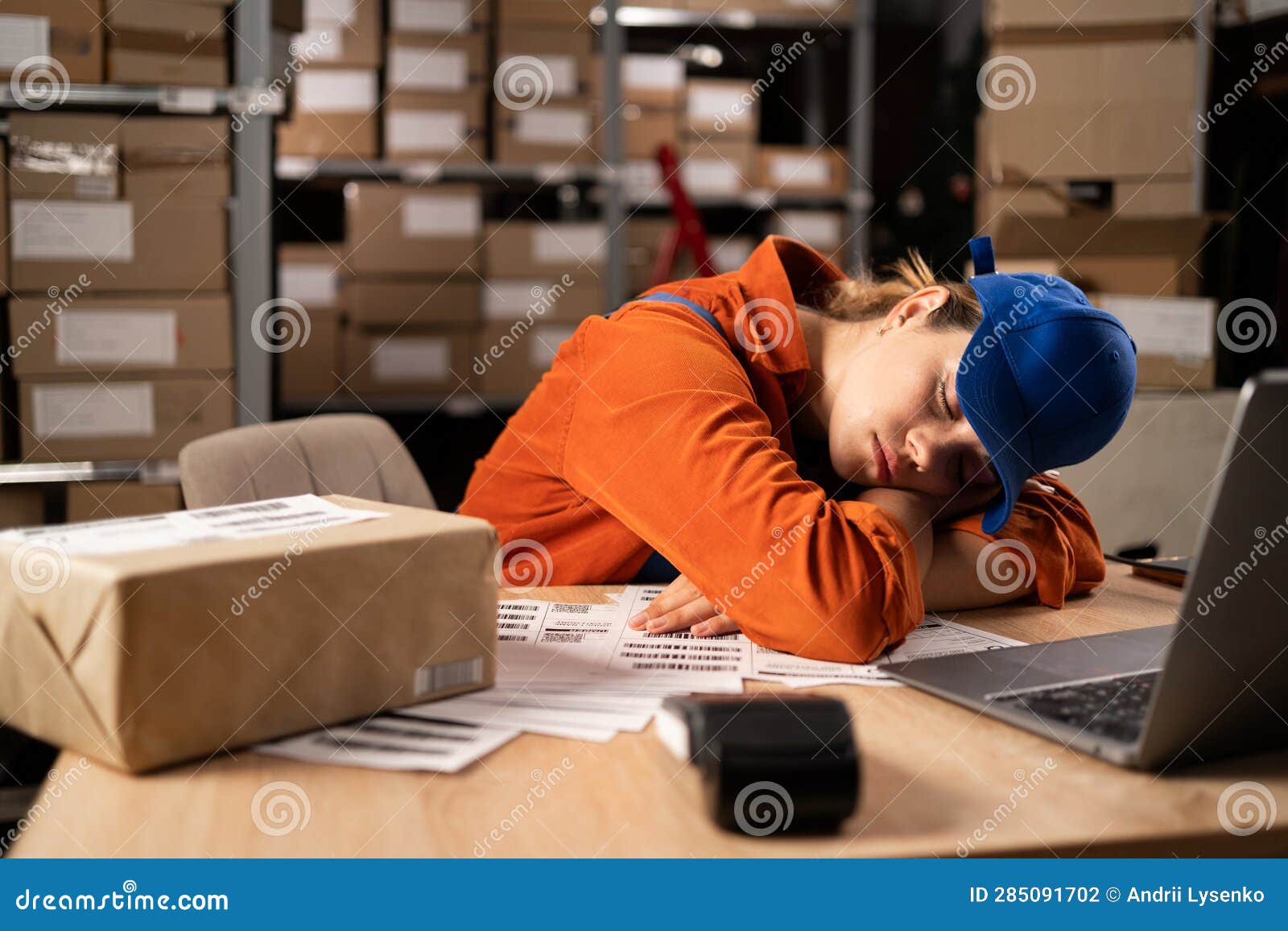 Lazy Female Worker Sleeping at the Table with Boxes in Working Hours in ...
