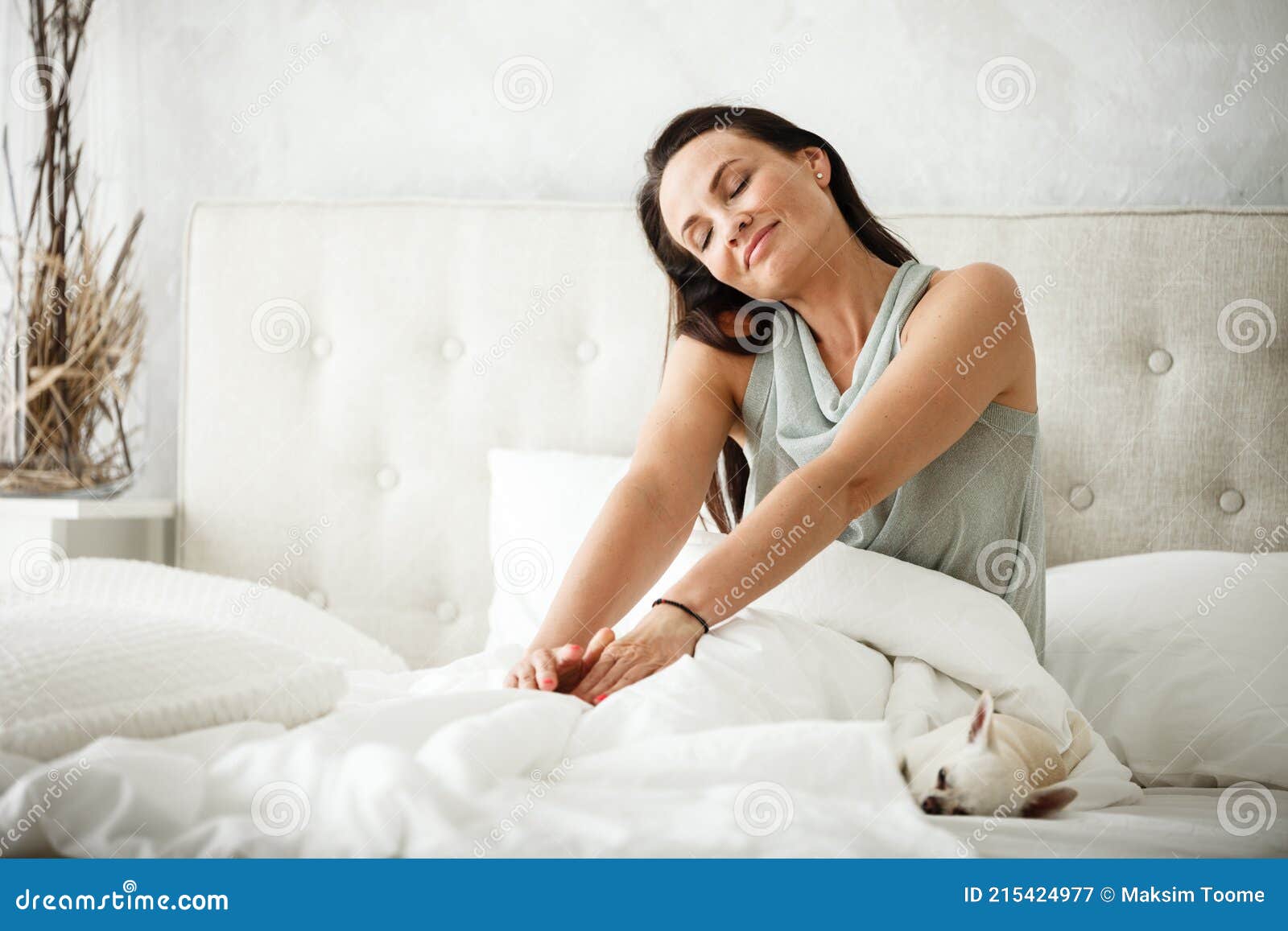 Lazy Morning Concept Beautiful Happy Woman Wakes Up In Bed And