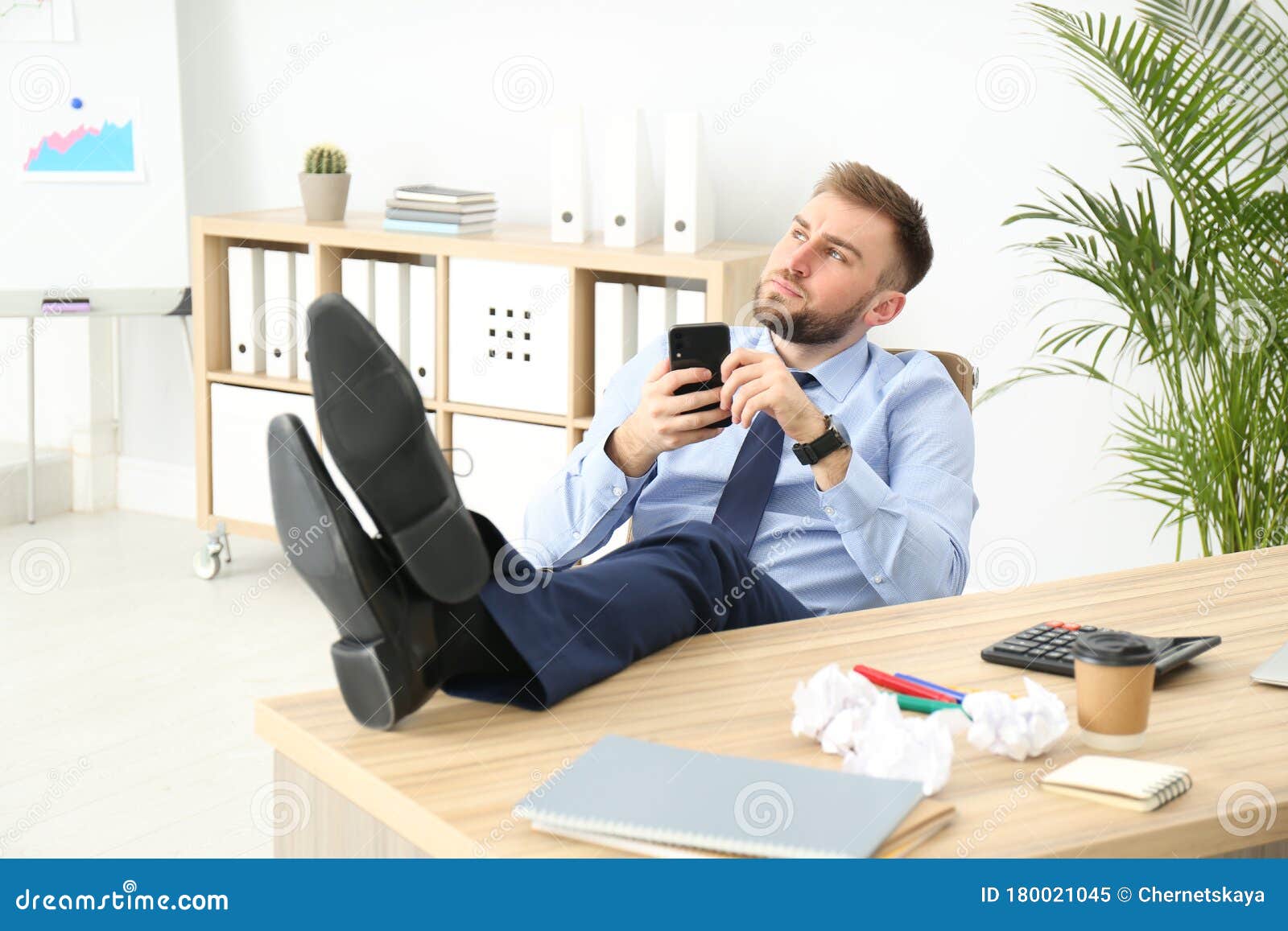 Lazy Office Employee with Mobile Phone Stock Image - Image of lazy ...