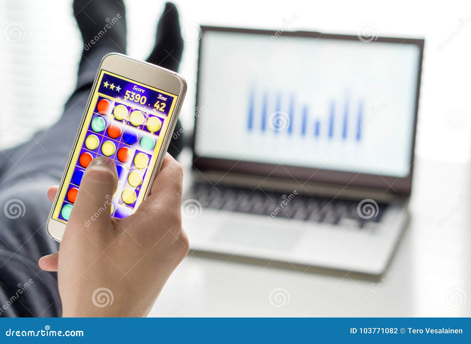 Lazy Office Worker Playing Mobile Game with Smartphone. Stock Photo ...