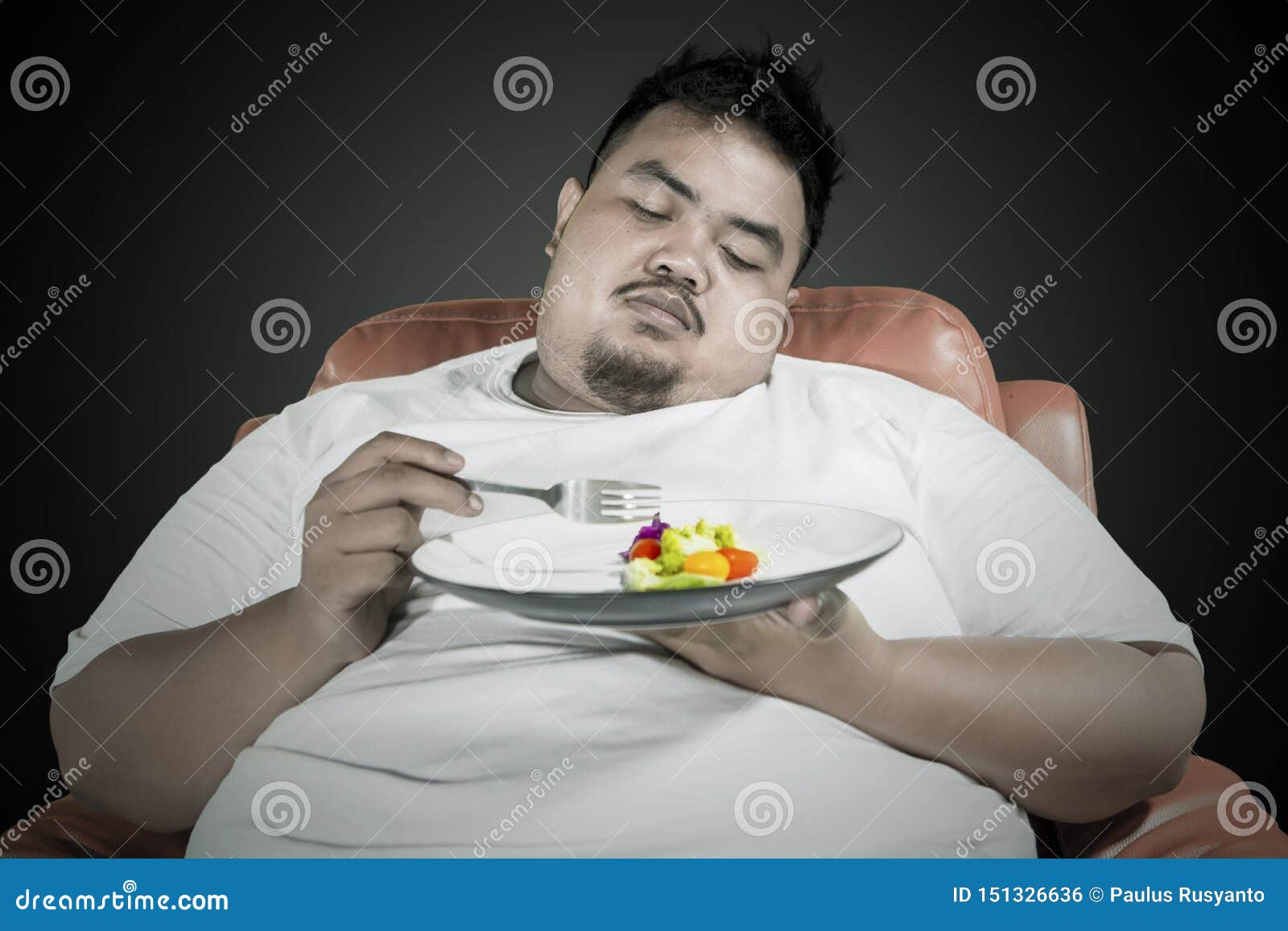 Lazy Overweight Man Eats Healthy Food Stock Photo - Image of doubt ... Lazy Overweight Man Eats Healthy Food Stock Photo - Image of doubt ...