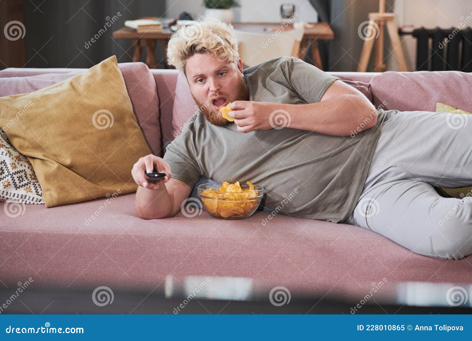 Lazy Man Eating Potato Chips and Watching TV Stock Image - Image of ... Lazy Man Eating Potato Chips and Watching TV Stock Image - Image of ...
