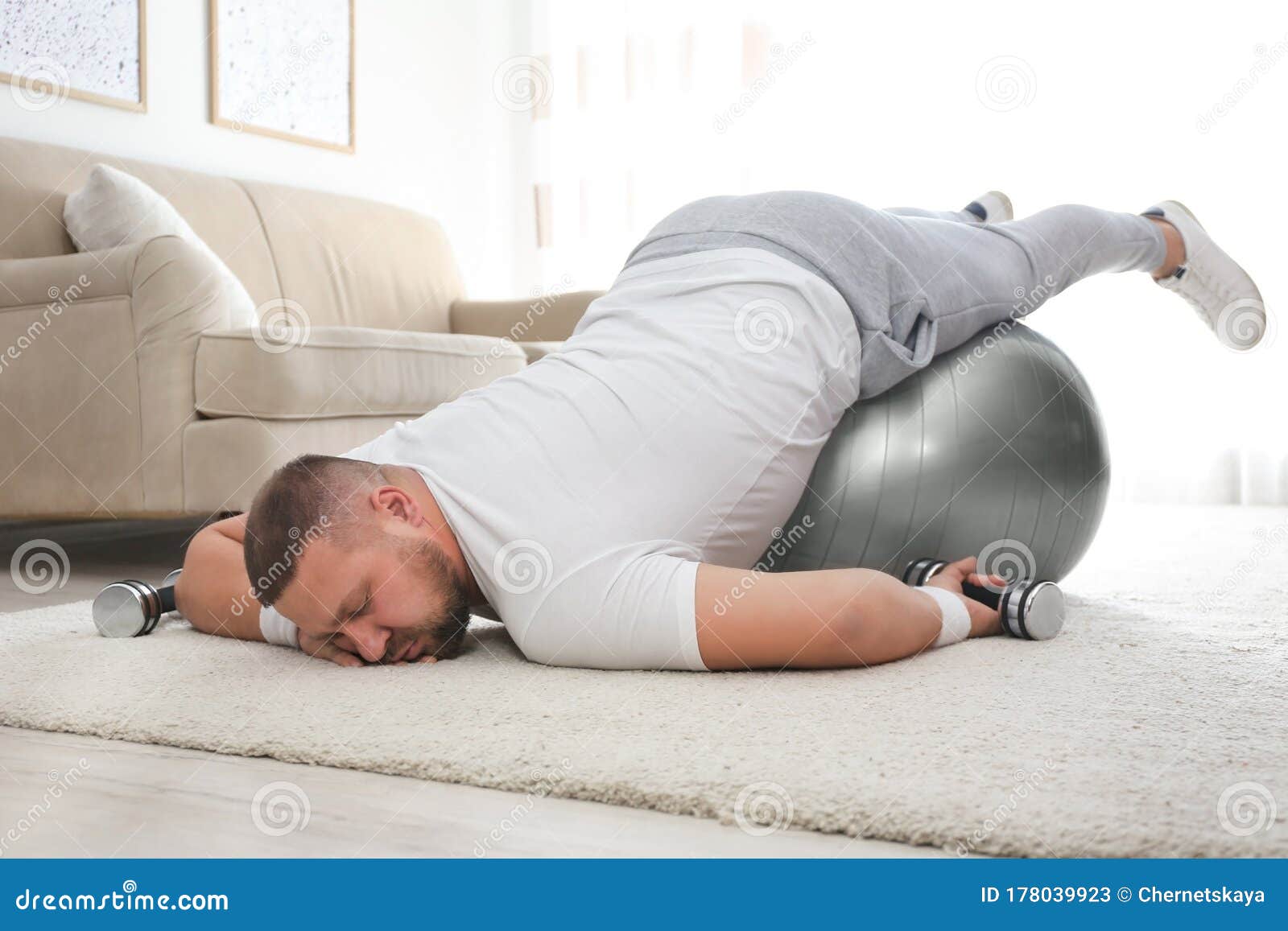 Lazy Overweight Man with Sport Equipment Sleeping on Floor Stock Image ... Lazy Overweight Man with Sport Equipment Sleeping on Floor Stock Image ...